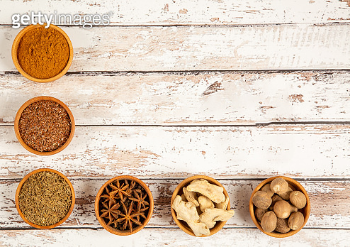 Cinnamon, Cumin, Flaxseed, Nutmeg, Stars of Anise and Ginger in Wooden ...