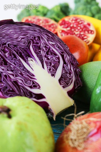 Close-up image of rainbow display of multi-coloured fruit and ...
