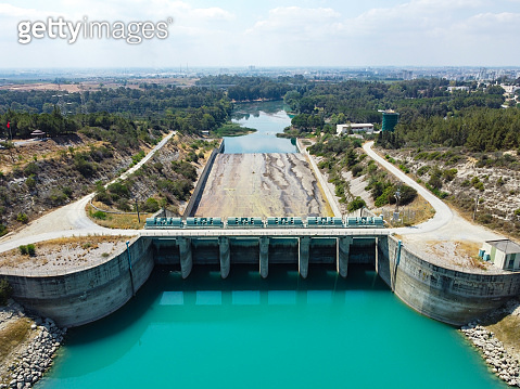 Aerial view of water reservoir, concrete rapid and closed reservoir ...
