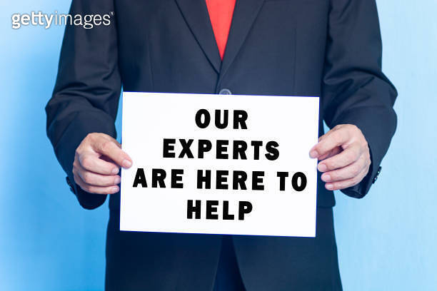 A business man holding a paper with text on a blue background - Our ...