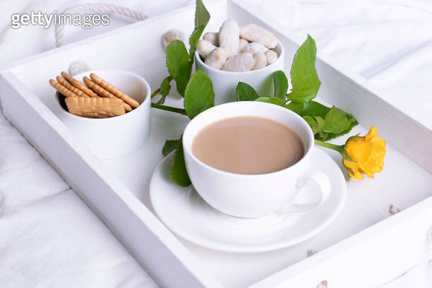 Morning coffee in a white tray on a white bed close-up. (1327798474 ...