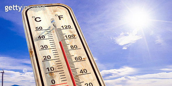 Thermometer on blue sky background, temperature forty degrees Celcius ...