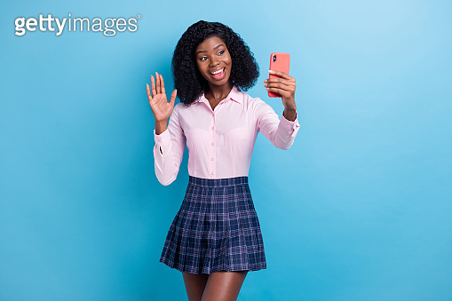 Photo portrait of pretty girl waving hand smiling talking on web camera ...