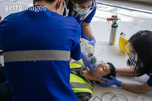 Team work medical emergency use Automated External Defibrillator (AED ...