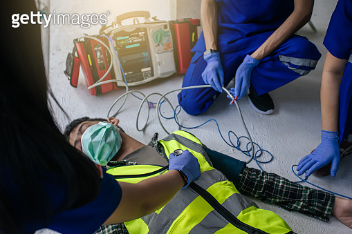 Team work medical emergency use Automated External Defibrillator (AED ...