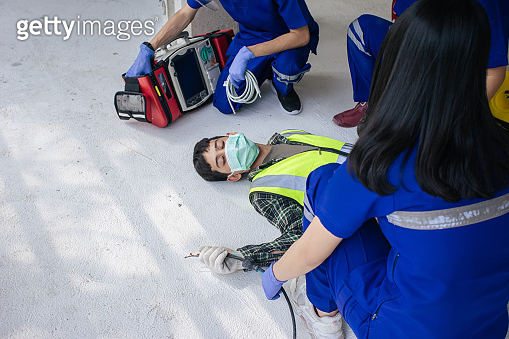 Team work medical emergency use Automated External Defibrillator (AED ...