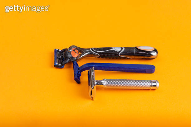 The evolution of the shaving machine on a yellow background. Razors ...