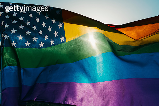 a rainbow US flag is waving on the sky 이미지 (1327079276) - 게티이미지뱅크