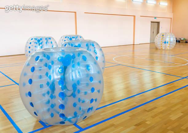 Zorbsoccer. Equipment for team building sport game named bumper ball or ...