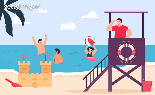 Beach lifeguard watching girls and boys playing ball in sea (1353851302 ...