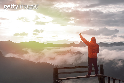 Man on top mountain win concept, Traveler hiking at nature,Mountain ...