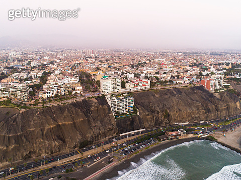 Aerial image made with drone over Lima city coast cliff during cloudy ...