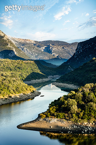 Stunning view of the Cedrino Lake (Lago del Cedrino) with the mountain ...