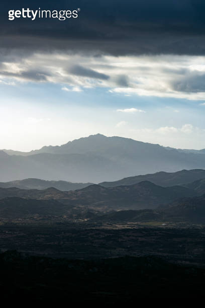View from above, stunning view of valley surrounded by a mountain range ...