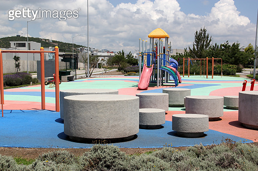 Outdoor community area with benches, tables and games for neighborhood ...