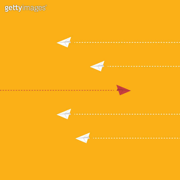 Think differently concept. Red airplane changing direction. New idea ...