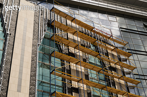 scaffolding and rafters of a part of the building during renovation ...