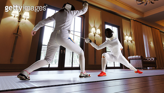 Two female fencing athletes fight in old fencing hall (1430582625) - 게티 ...