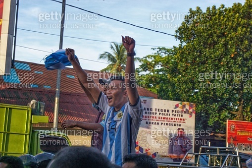 Ambon, Indonesia - Dec 10th, 2022: Argentina spectatorsion street ...