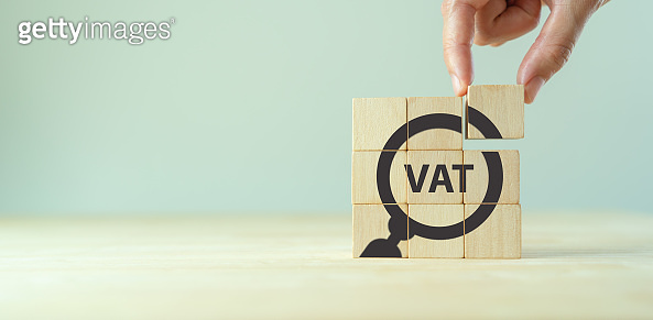 VAT concept. Value Added Tax. VAT text and magnifying glass icon on ...