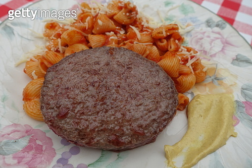 Ground beef hash brown served with pipe rigate pasta with tomato sauce ...