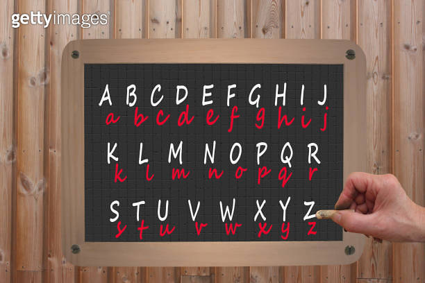 Alphabet in uppercase and lowercase letters Handwritten with chalk on a ...