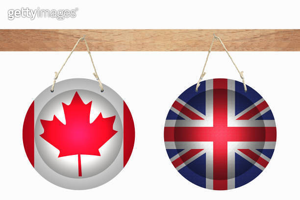 Flags hanging in the colors of the Canadian and British flag ...