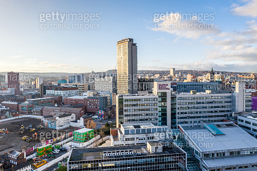 Aerial view of Sheffield city centre skyline at sunset with The Arts ...