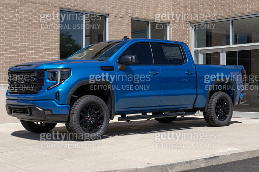 GMC Sierra 1500 pickup display at a dealership. GMC offers the Sierra ...