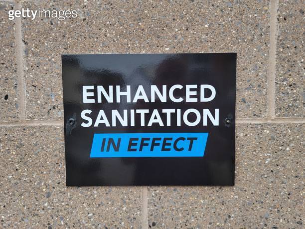 enhanced sanitation in effect sign on brick wall (1402479427) - 게티이미지뱅크
