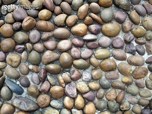 earth tone color pebble stone embedded in concrete texture (1390398334 ...