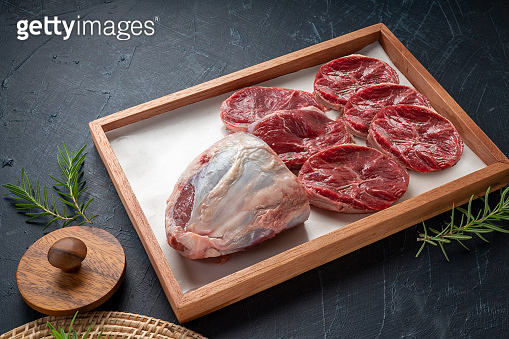 Sliced brisket beef on black plate isolated on white background, Sliced ...