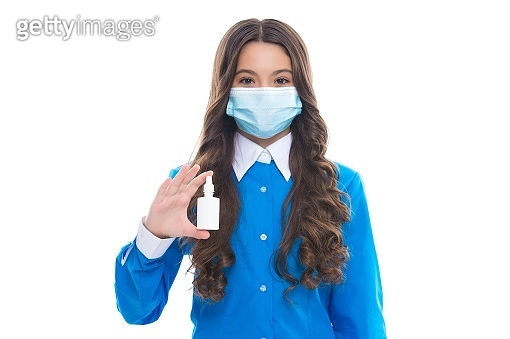 kid in respirator mask with nasal drop or spray for treatment of runny ...