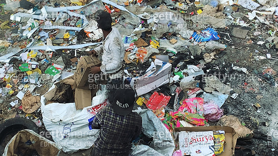 Burning pile of garbage at dump ground or landfill releasing toxic ...