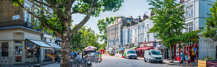 London Primrose Hill people in pretty street shops restaurants panorama ...