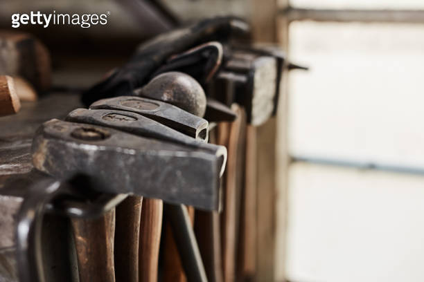 Hammer, hanging workshop tools and construction worker or industrial ...