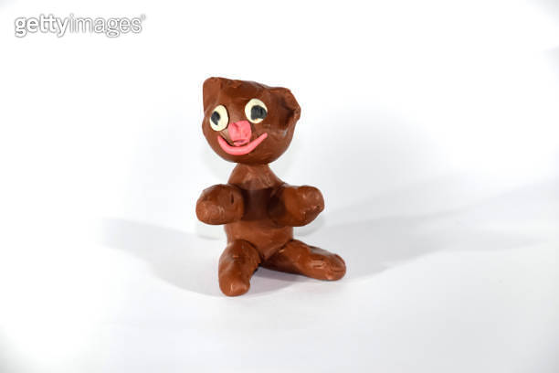 Plasticine bear. Toys made of plasticine on white background ...