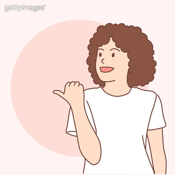 Woman is pointing with her thumb to suggest something interesting ...