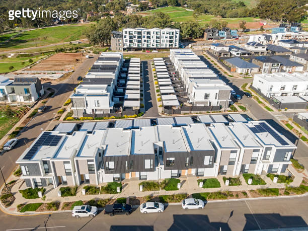 Aerial view looking down on new, modern housing development in ...