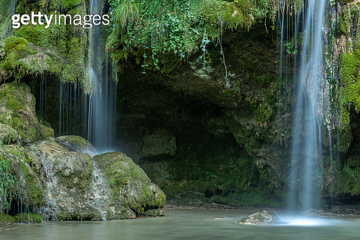 Tuff waterfalls at the source of the Cuisance river near Arbois ...