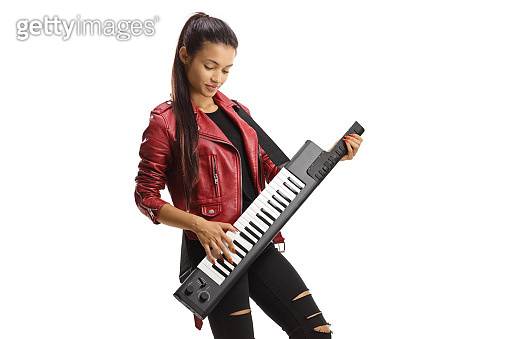 Female musician in a leather jacket playing a keytar 이미지 (1423559668 ...