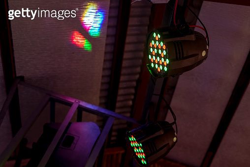 2 PAR lights installed on the ceiling of a bar or nightclub. Also known ...