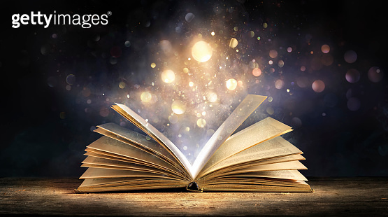 Magic Book With Glitter - Open Book With Lights Glowing In Dark ...