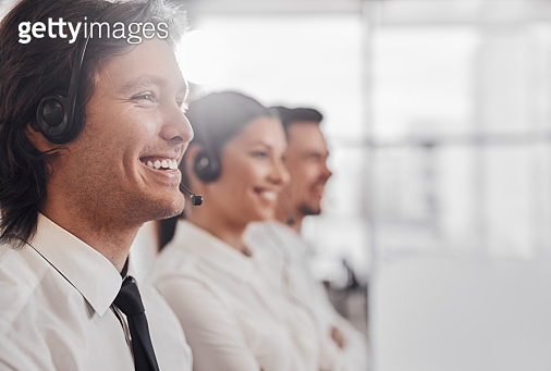 Happy help line agent with team 이미지 (1385568348) - 게티이미지뱅크