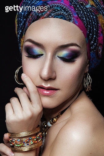 Portrait of a female model in ethnic indian costume with jewellery and ...