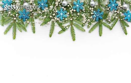 A horizontal garland of spruce branches, Christmas tree decorations ...