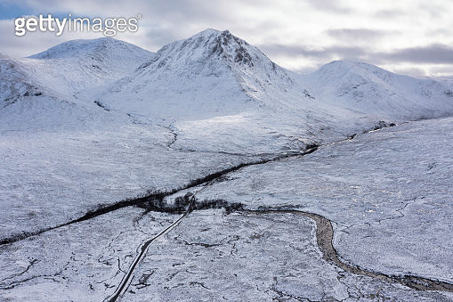 Epic aerial drone landscape image of Stob Dearg and Glencoe in Scottish ...