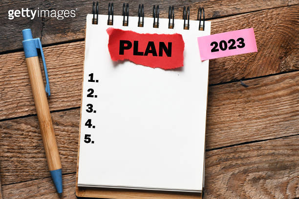 Plan 2023 words written in an office notebook. Concept in business ...