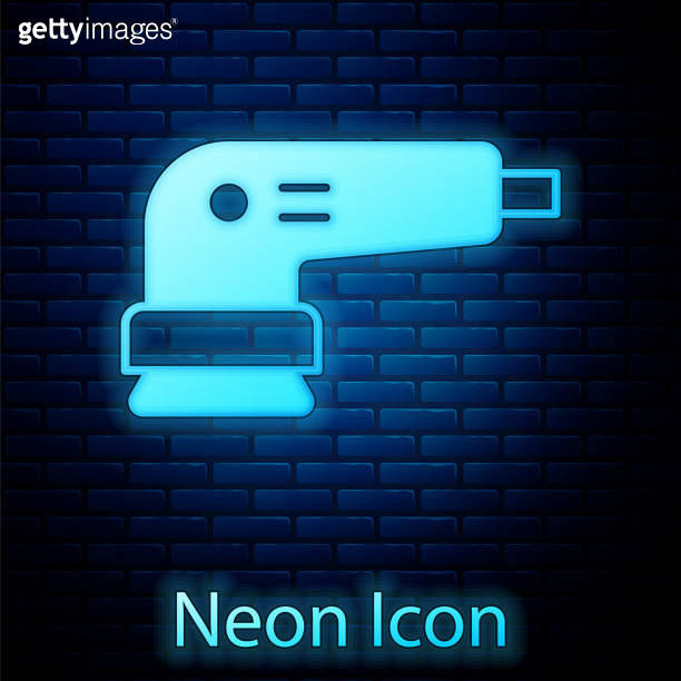 Glowing neon Electric sander icon isolated on brick wall background ...