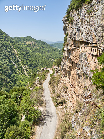 The Holy Kipinas Monastery that is wedged in a rock, near to Kalarrites ...